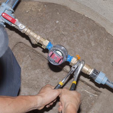Connecting A Water Meter To Your House | DoItYourself.com