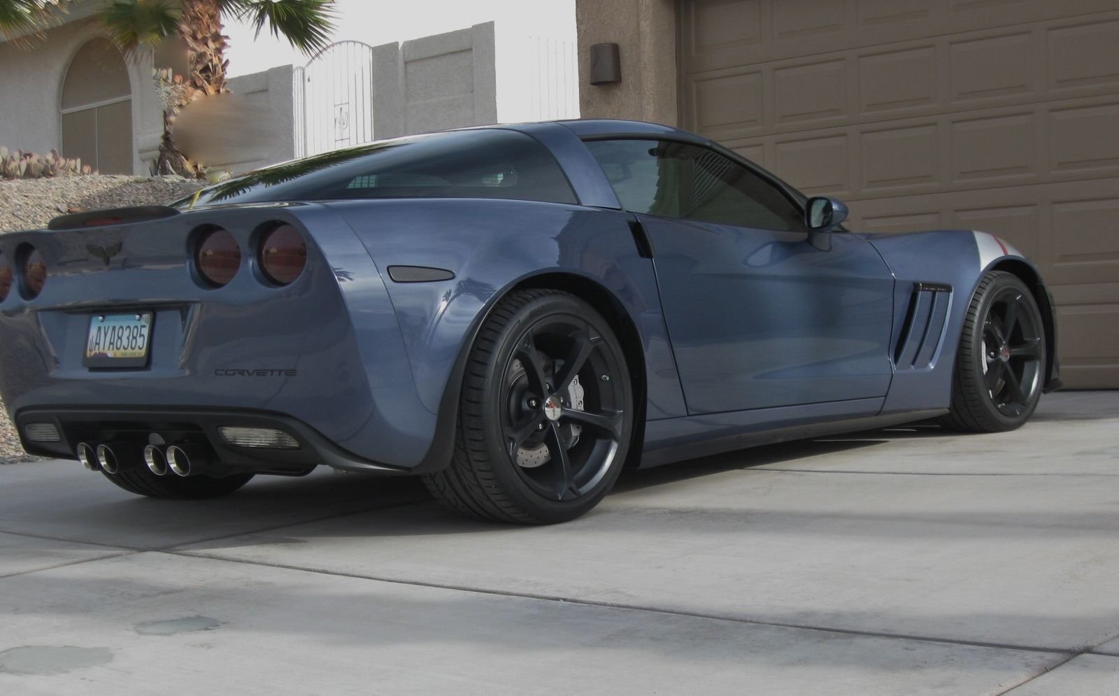 Any pics of a base C6 with just the rear lowered on stock bolts ...