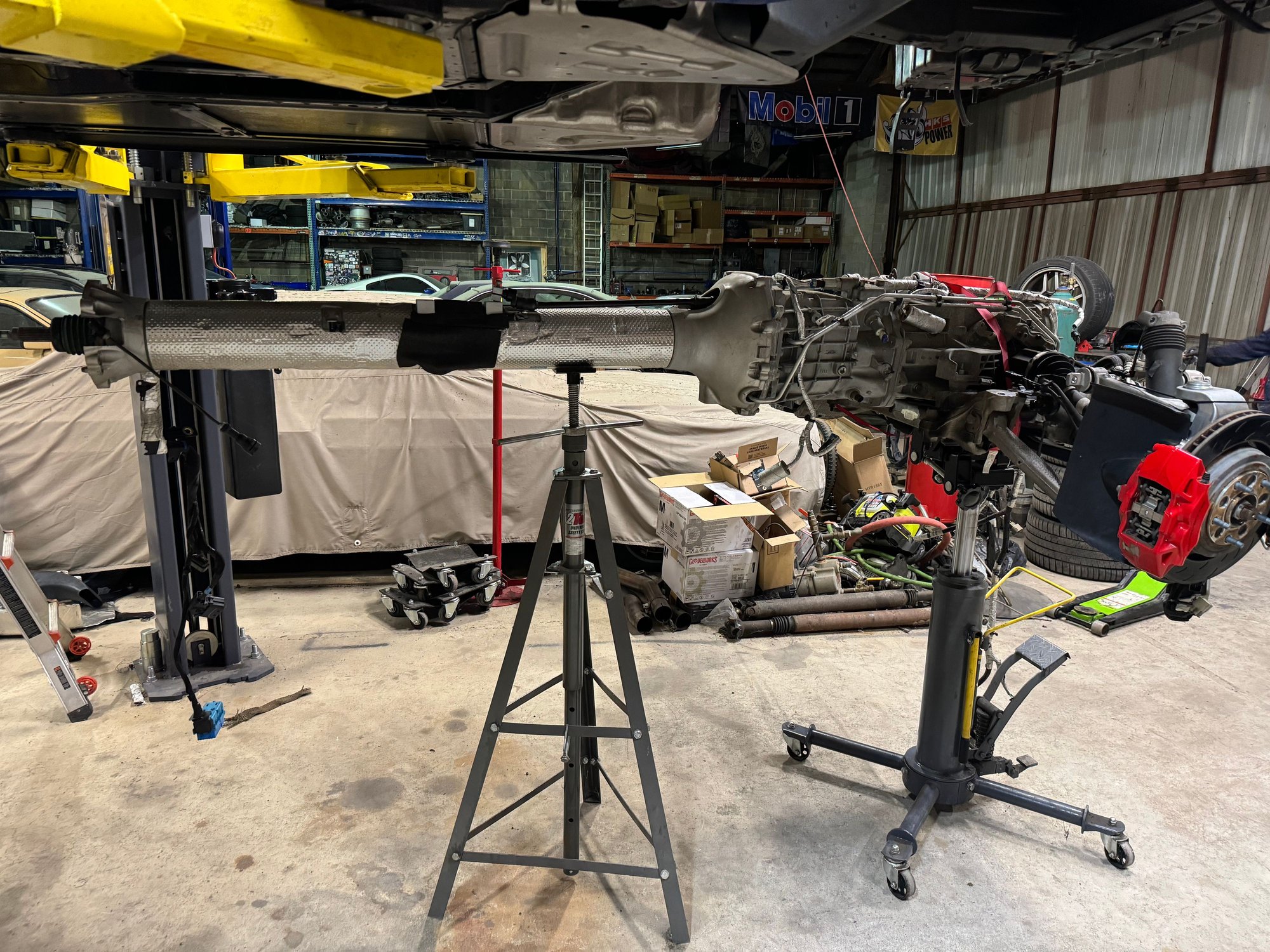 Pulling engine on a lift; through the top or drop cradle ...