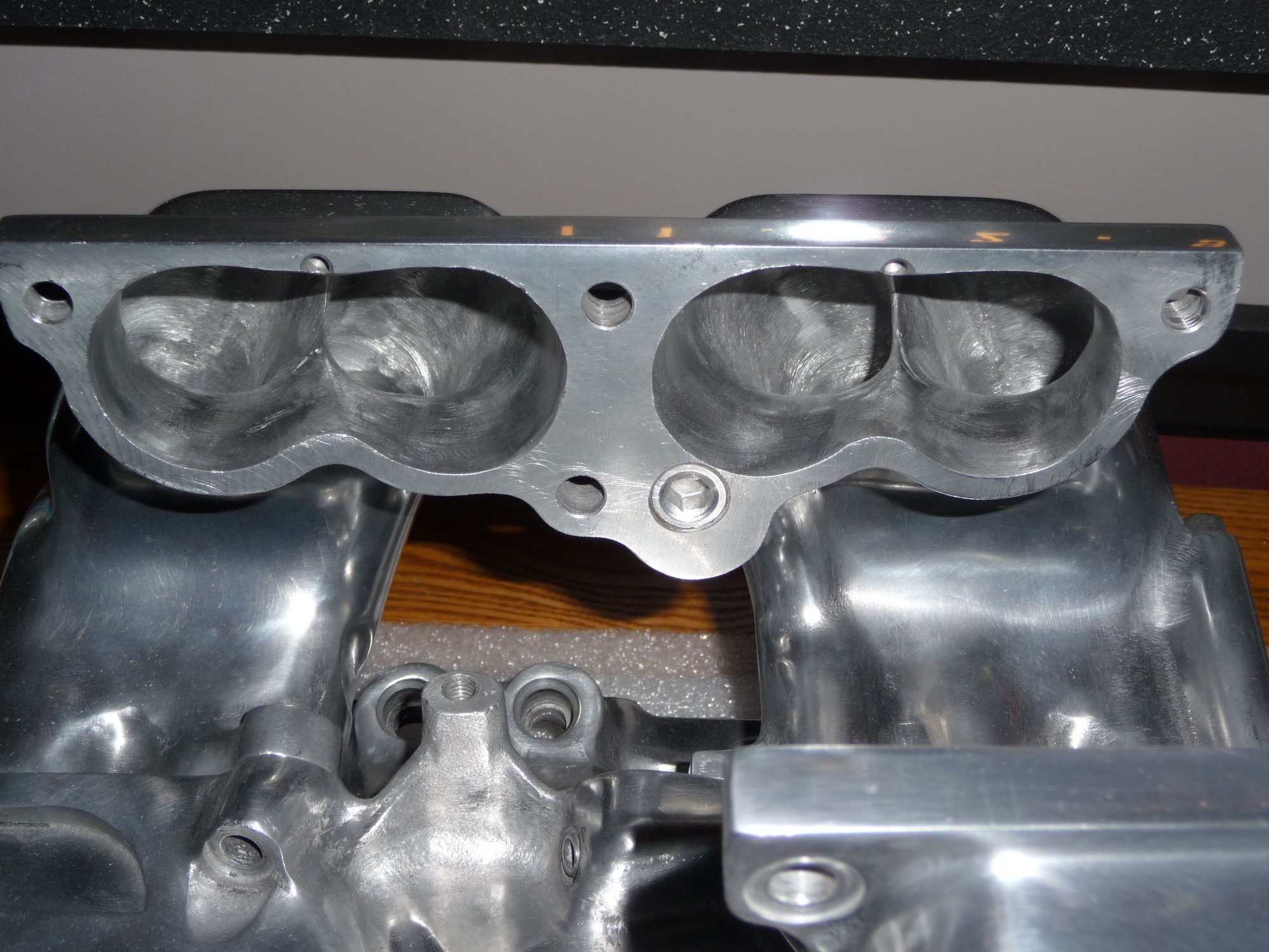 Can the factory TPI intake be reduced in height by shortening the ...