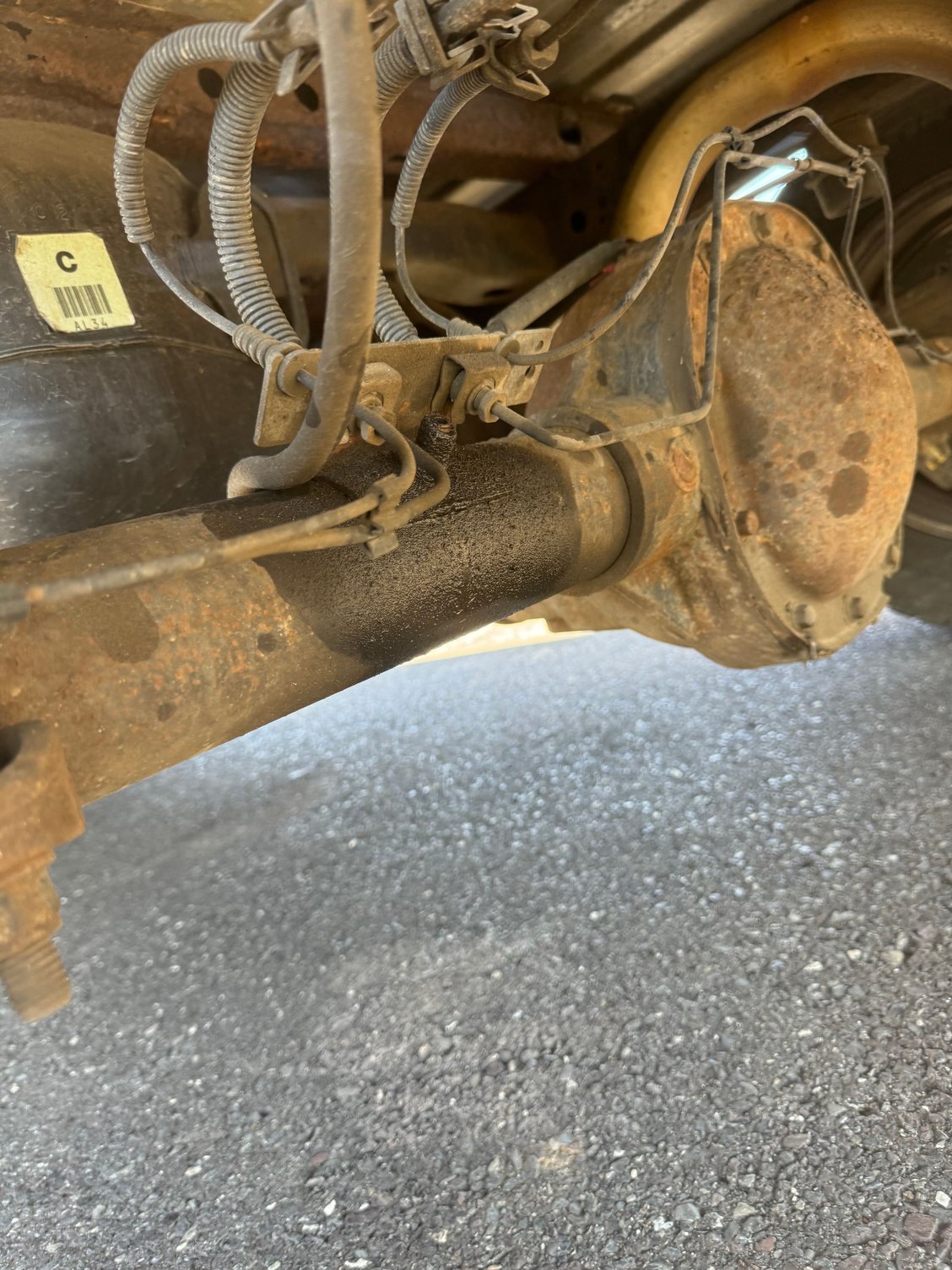 leak on rear axle shaft - brake fluid or differential? - Ford F150 ...