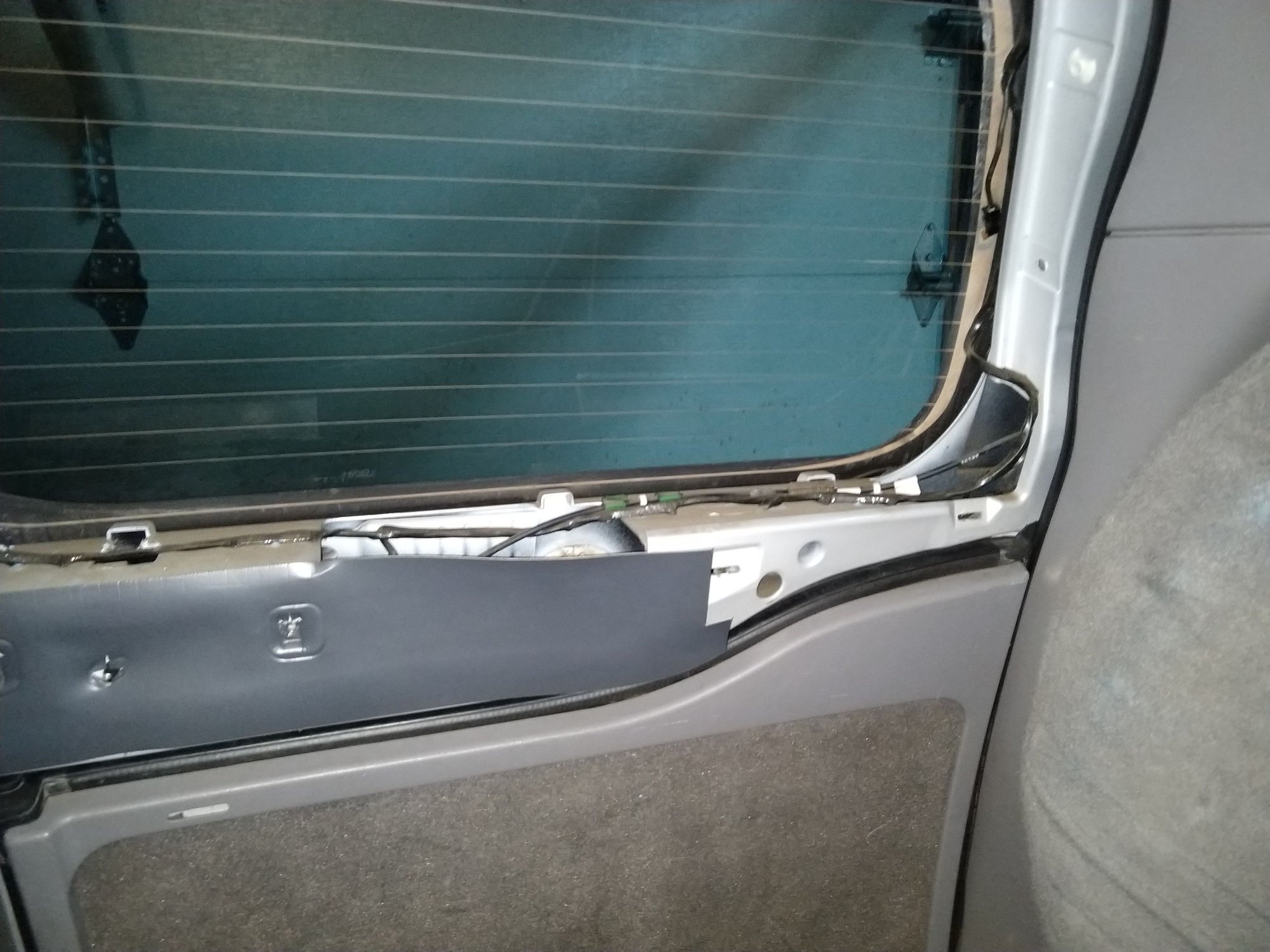 How to remove Excursion rear hatch trim and replace rear defroster tab ...