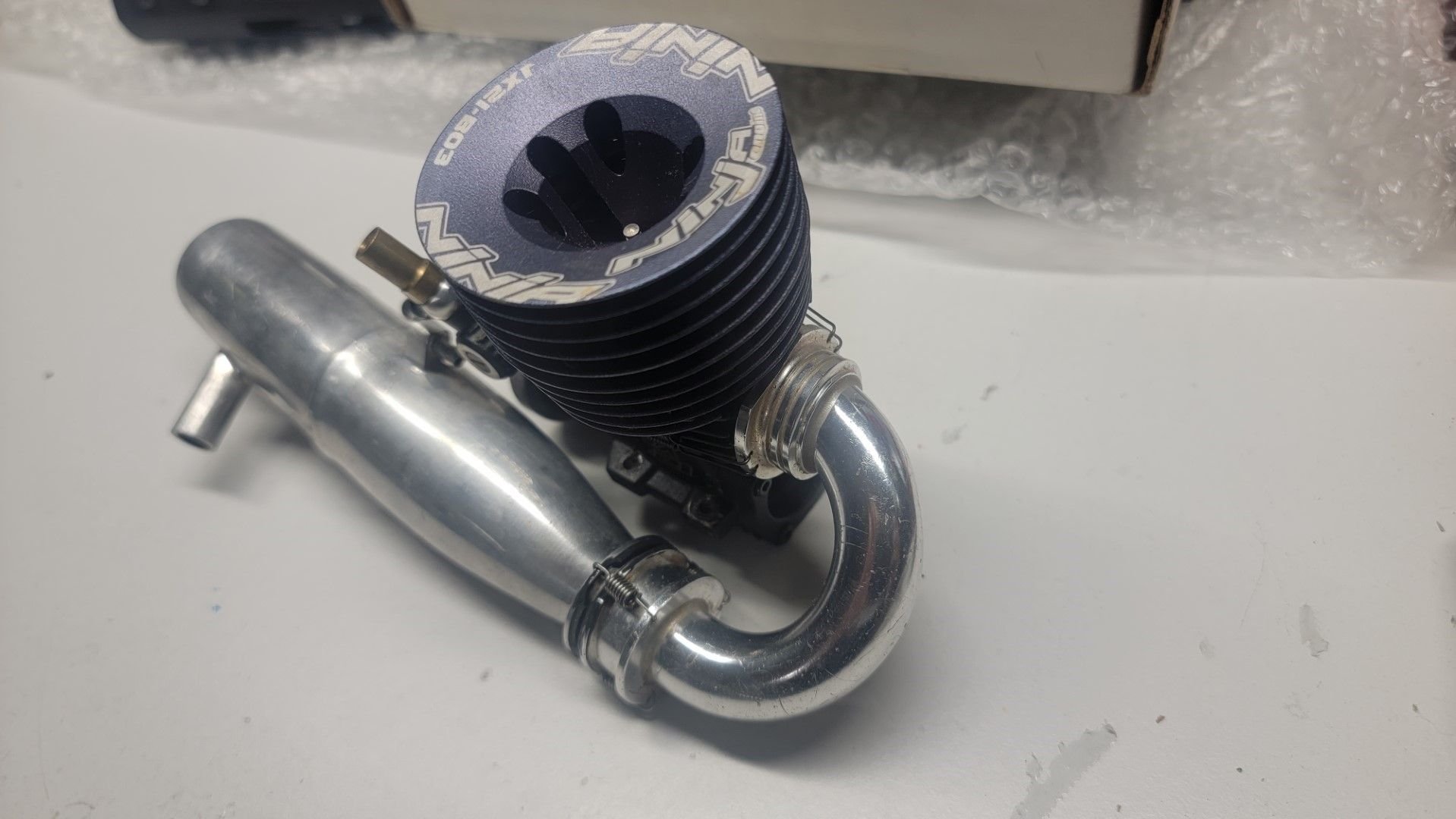 Mugen Seiki Ninja JX21-B03 3-Port, OS 2090SC Pipe 75mm Manifold - R/C Tech Forums