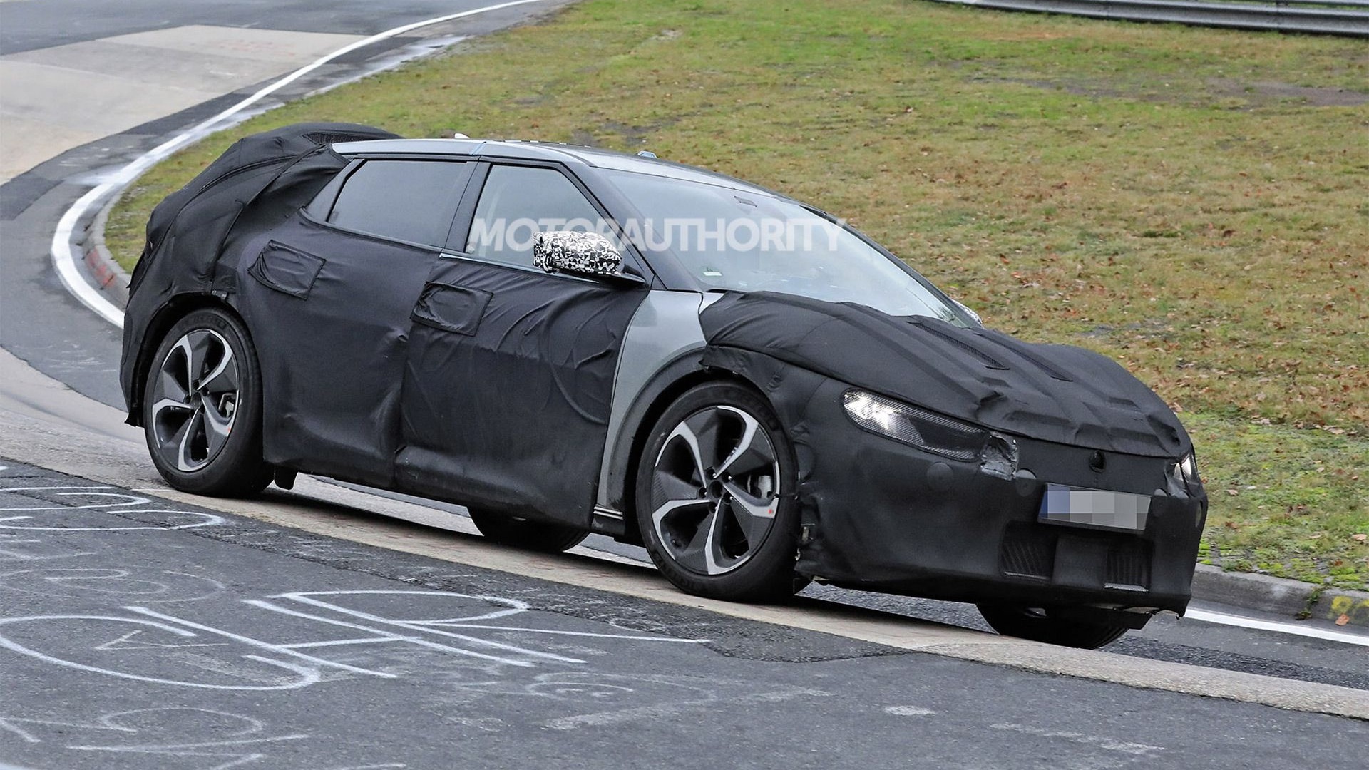 2022 Kia CV spy shots: Electric crossover SUV coming shortly